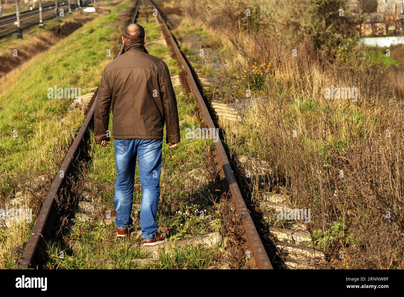 The male on rails. The man on the railroad. Concept beginning of a way ...