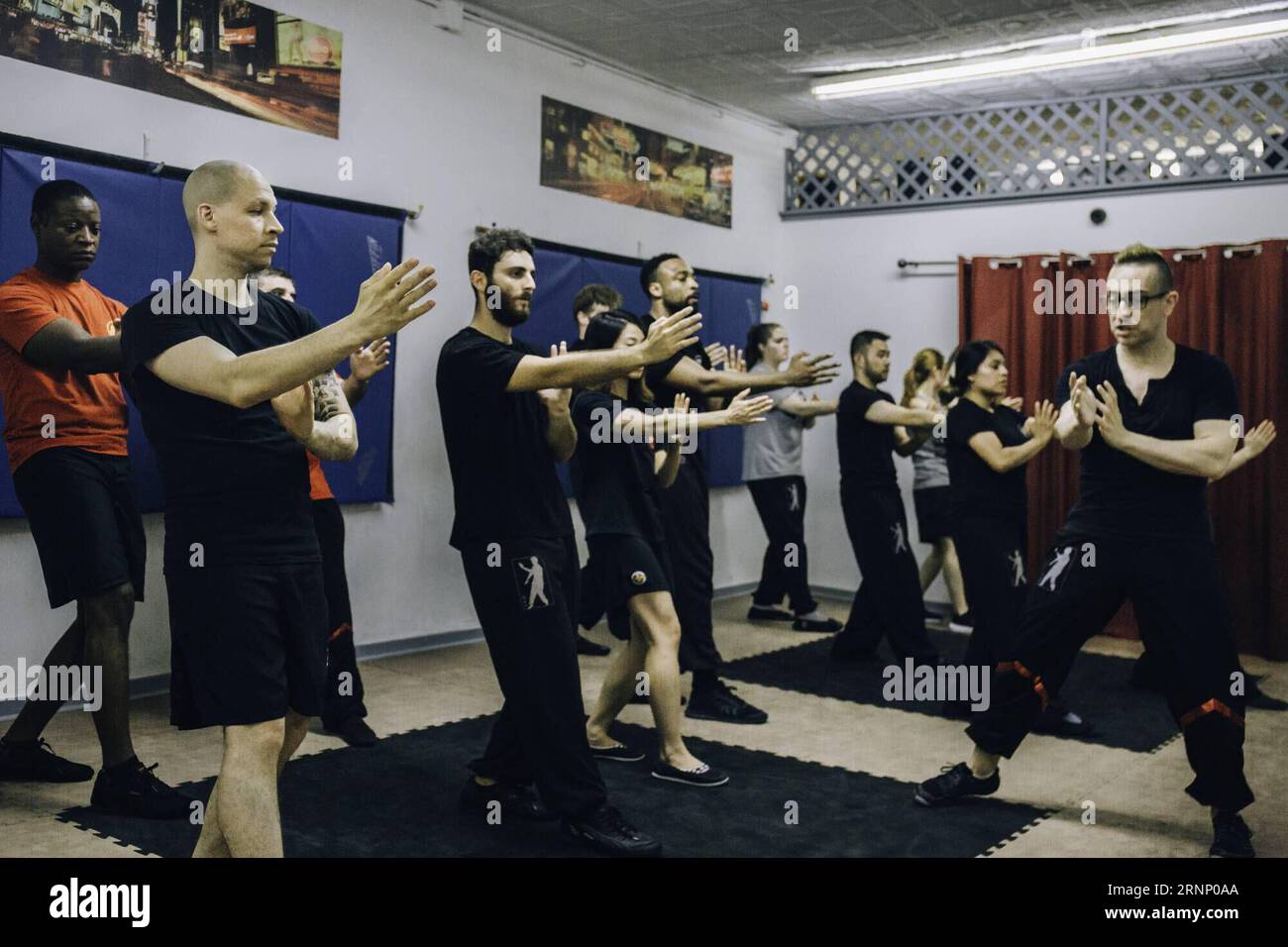 (170803) -- NEW YORK, Aug. 3, 2017 -- Alex Richter (1st R) gives ...
