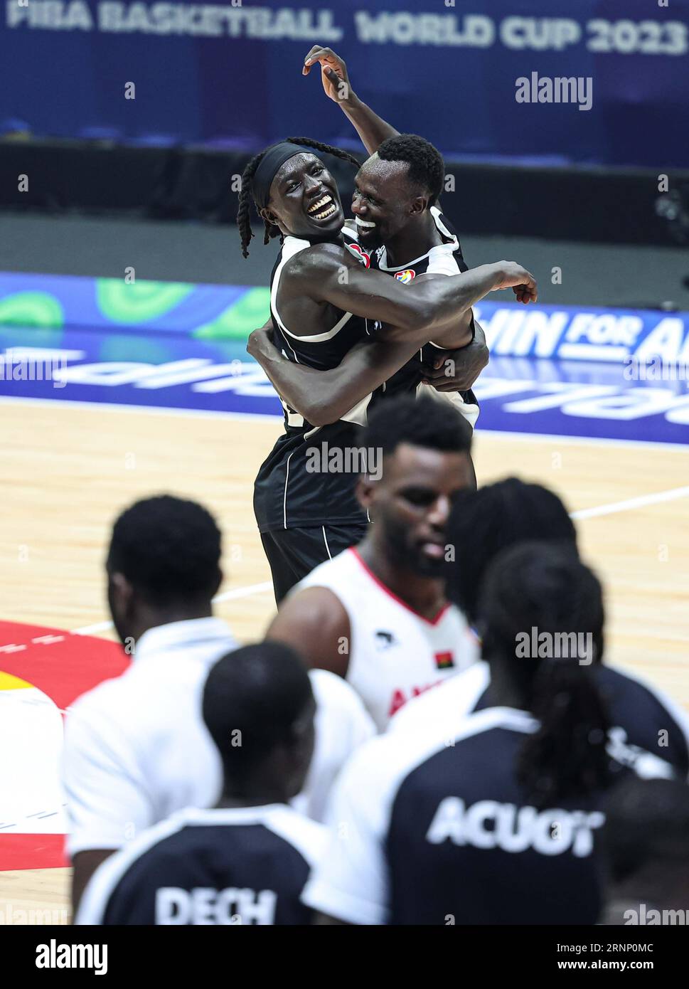 Manila, Philippines. 2nd Sep, 2023. Majok Deng (top, R) of South Sudan ...