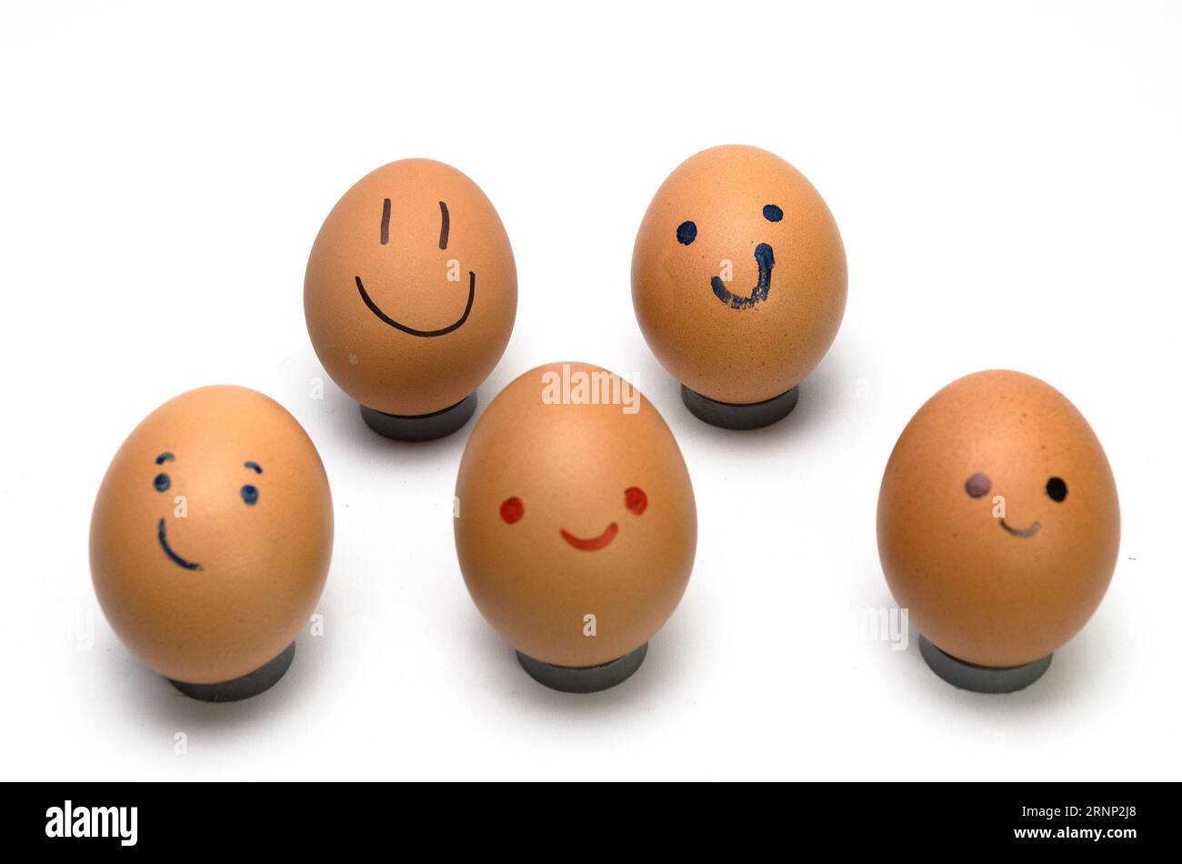 eggs with smile emotion isolated on white background Stock Photo - Alamy