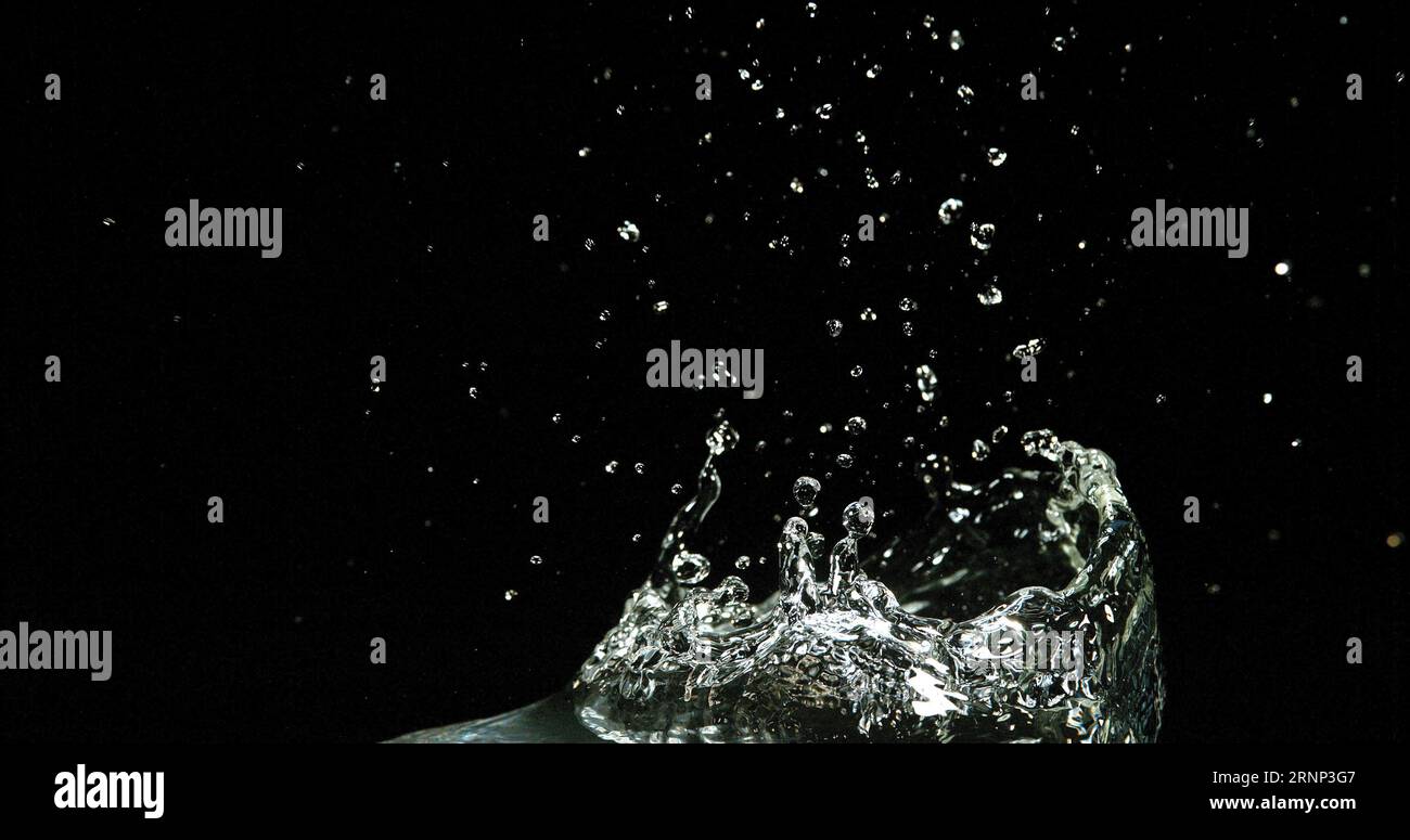 Water Exploding and Splashing against Black Background Stock Photo - Alamy