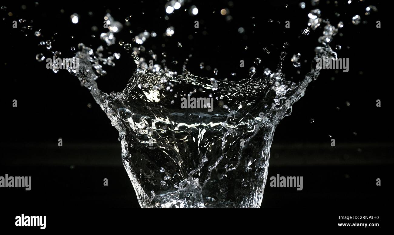 Water Exploding and Splashing against Black Background Stock Photo - Alamy