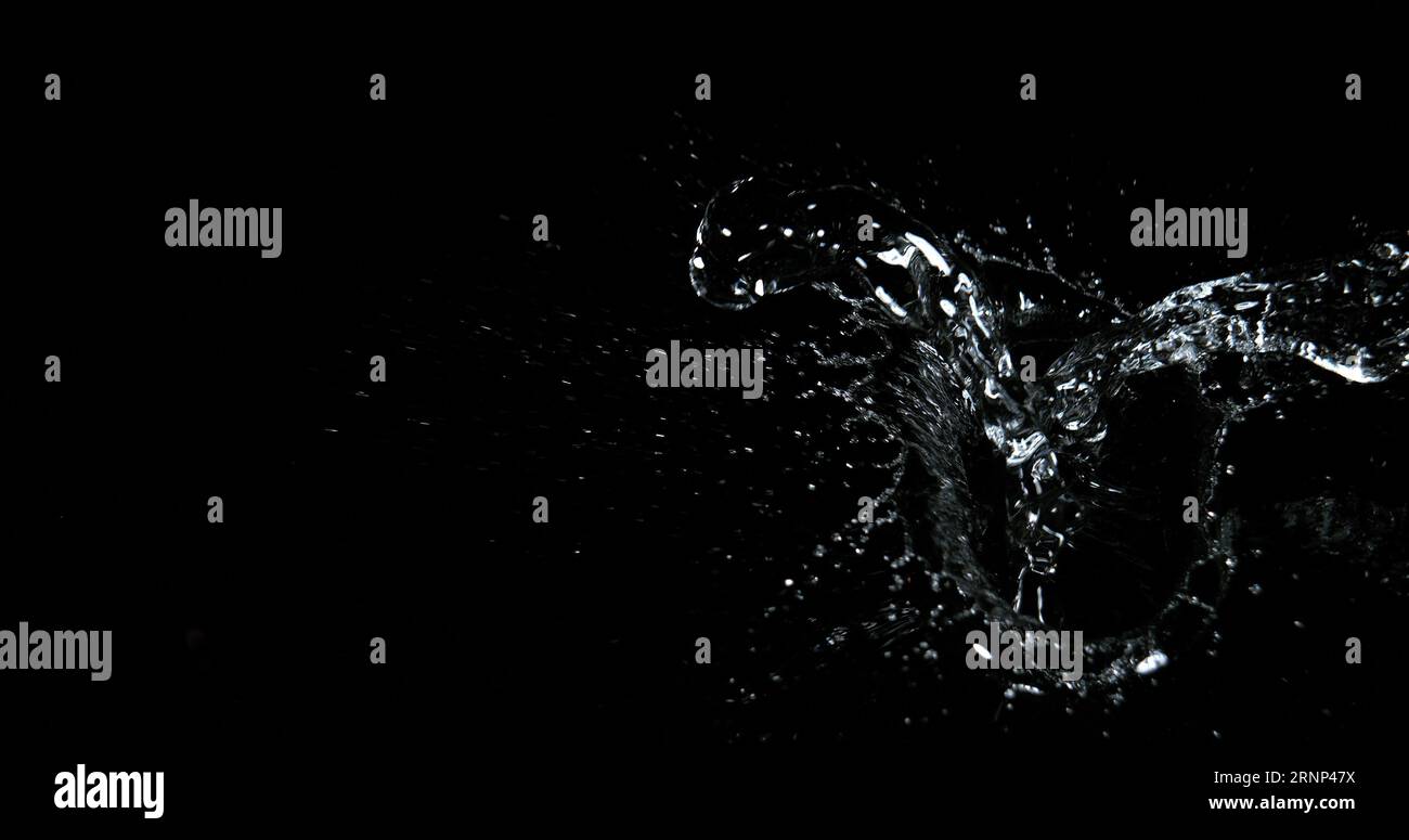 Water Exploding and Splashing against Black Background Stock Photo - Alamy