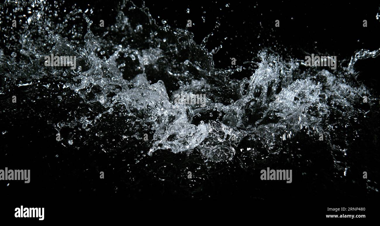 Water Exploding and Splashing against Black Background Stock Photo - Alamy