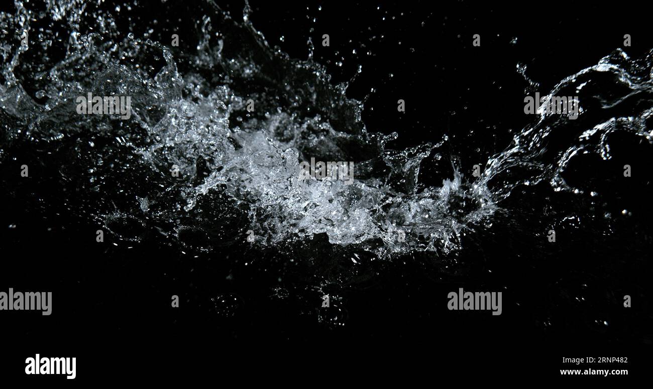 Water Exploding and Splashing against Black Background Stock Photo - Alamy