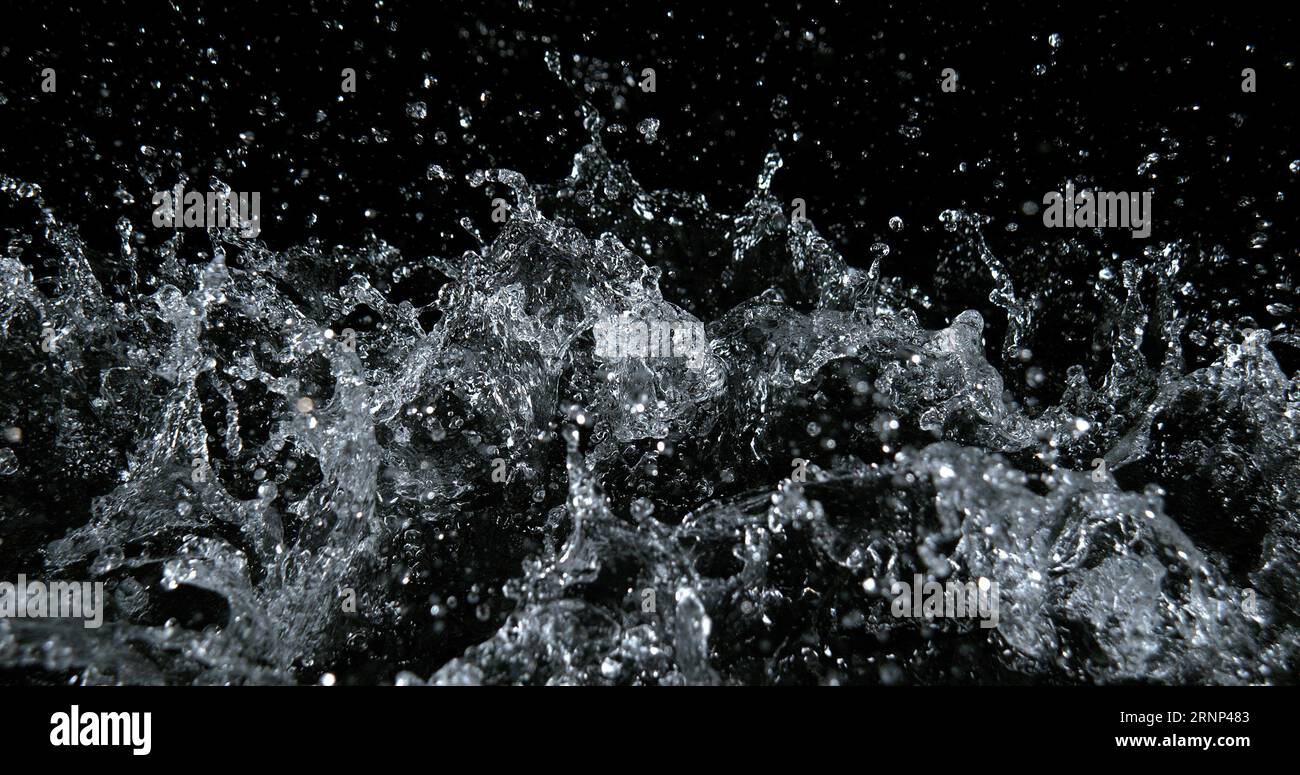Water Exploding and Splashing against Black Background Stock Photo - Alamy
