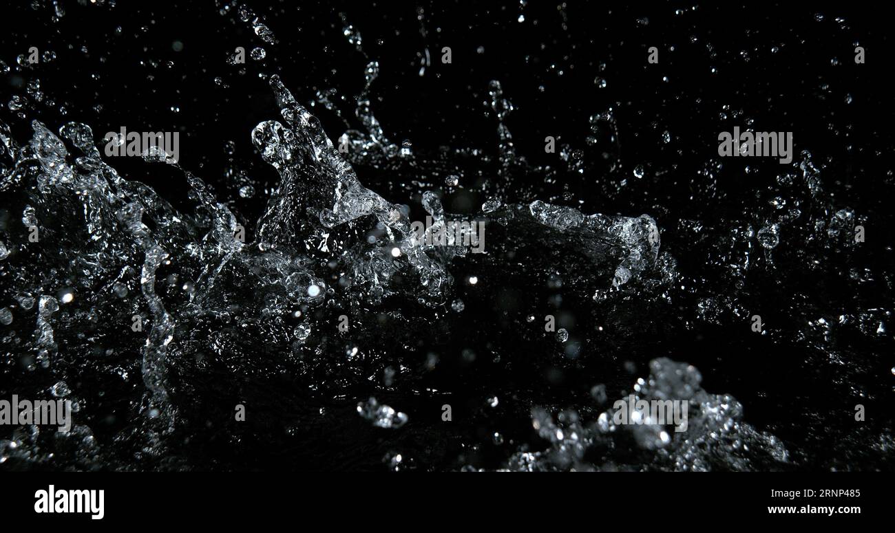 Water Exploding and Splashing against Black Background Stock Photo - Alamy