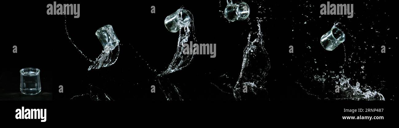 Glass of Water Bouncing and Splashing on Black Background Stock Photo ...