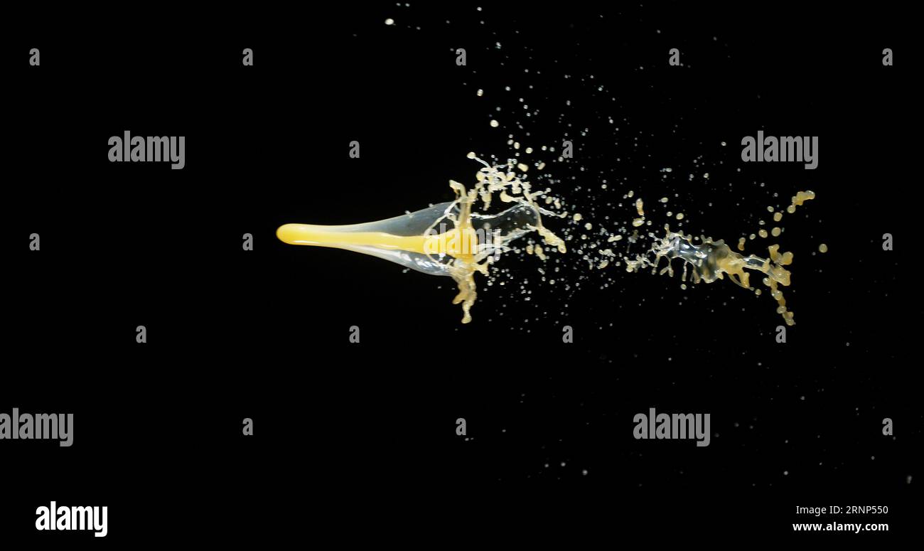 Orange Juice Exploding and Splashing on Black Background Stock Photo ...