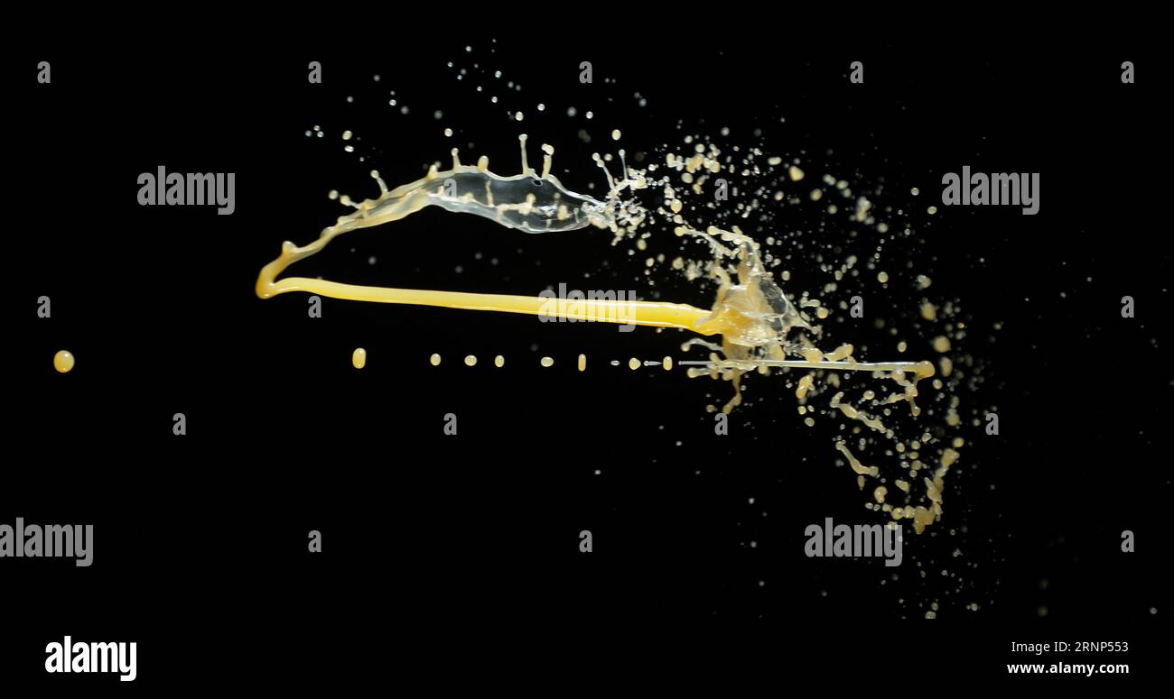 Orange Juice Exploding and Splashing on Black Background Stock Photo ...