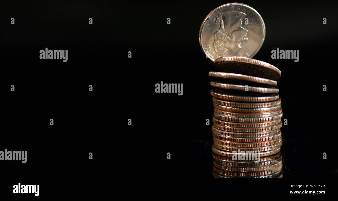 Quarter Dollar Coins Falling, Rolling and Sliding on Black Background ...