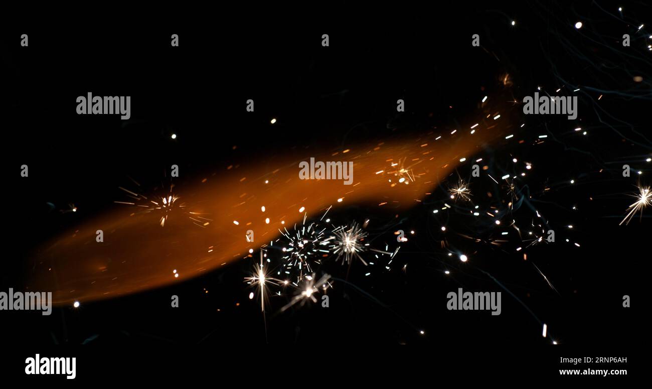 Flame and Sparkling Candle against black background Stock Photo - Alamy