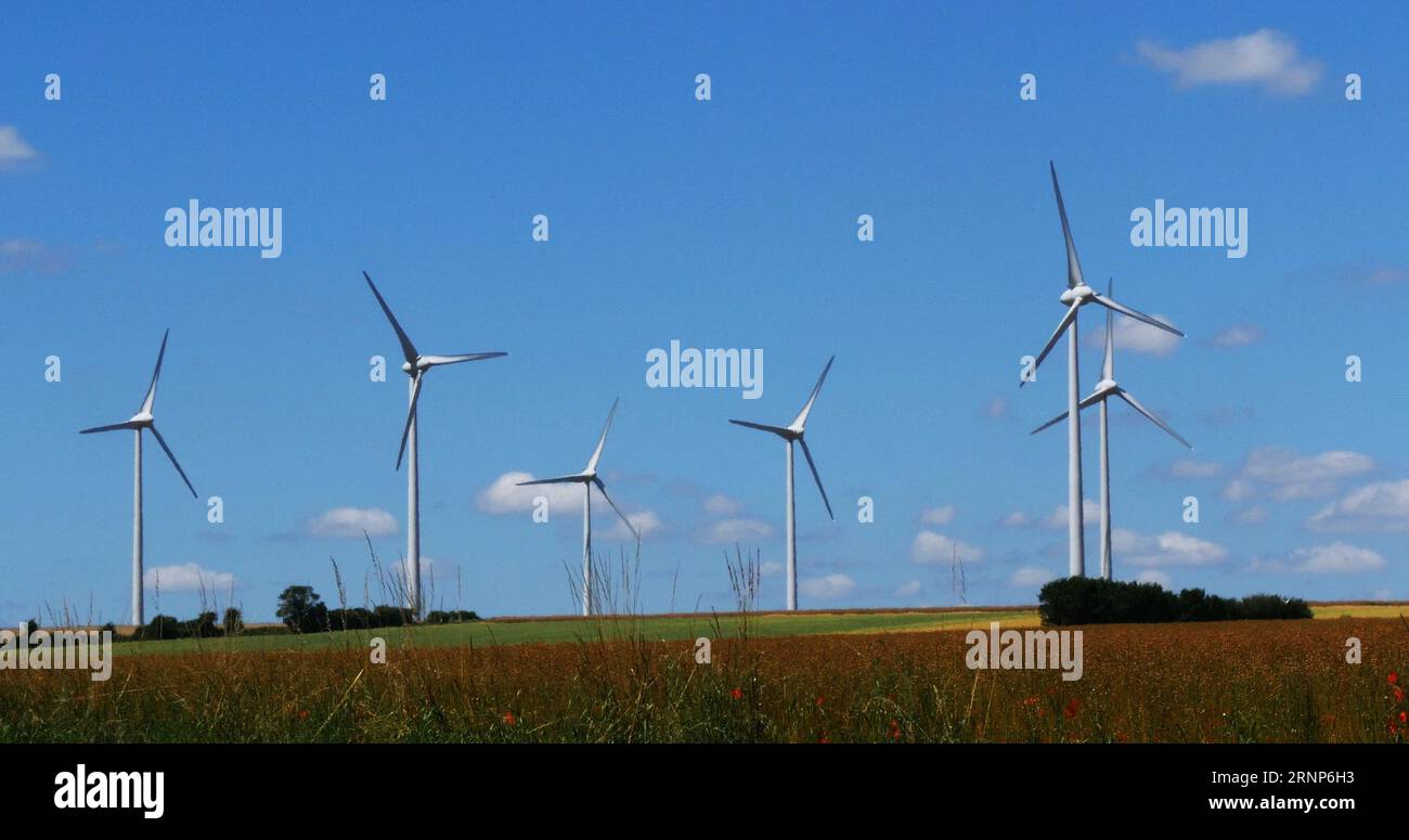 Wind Turbines with Blue Sky, near Caen in Normandy in France Stock ...