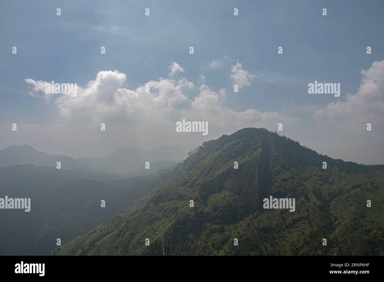 View from Mini Adams Peak in Ella, Sri Lanka with hill, clouds and sky Stock Photo - Alamy