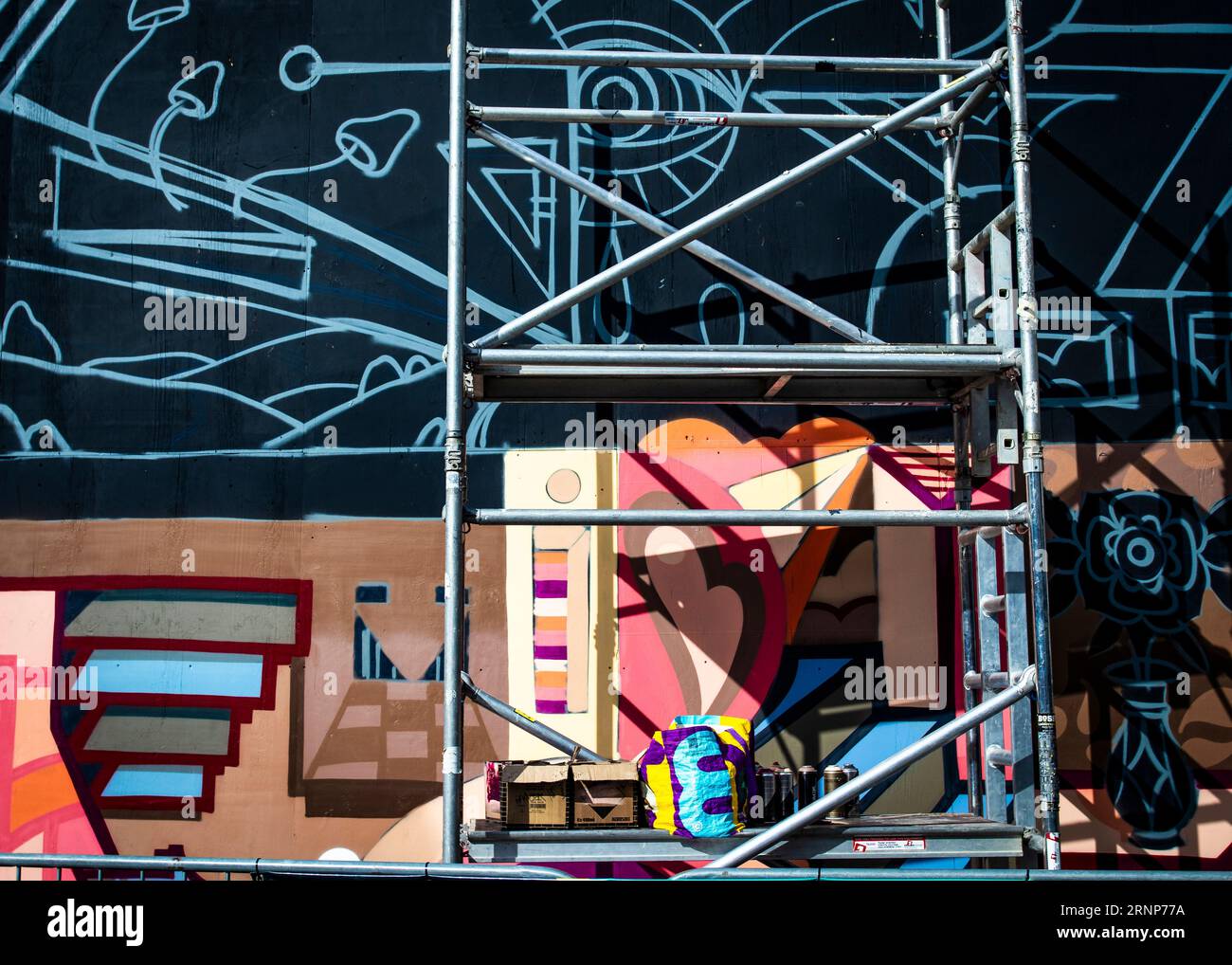 Graffiti artists creating street art pieces at the at the Southend City ...