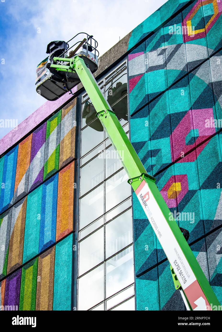 Graffiti artists creating street art pieces at the at the Southend City ...