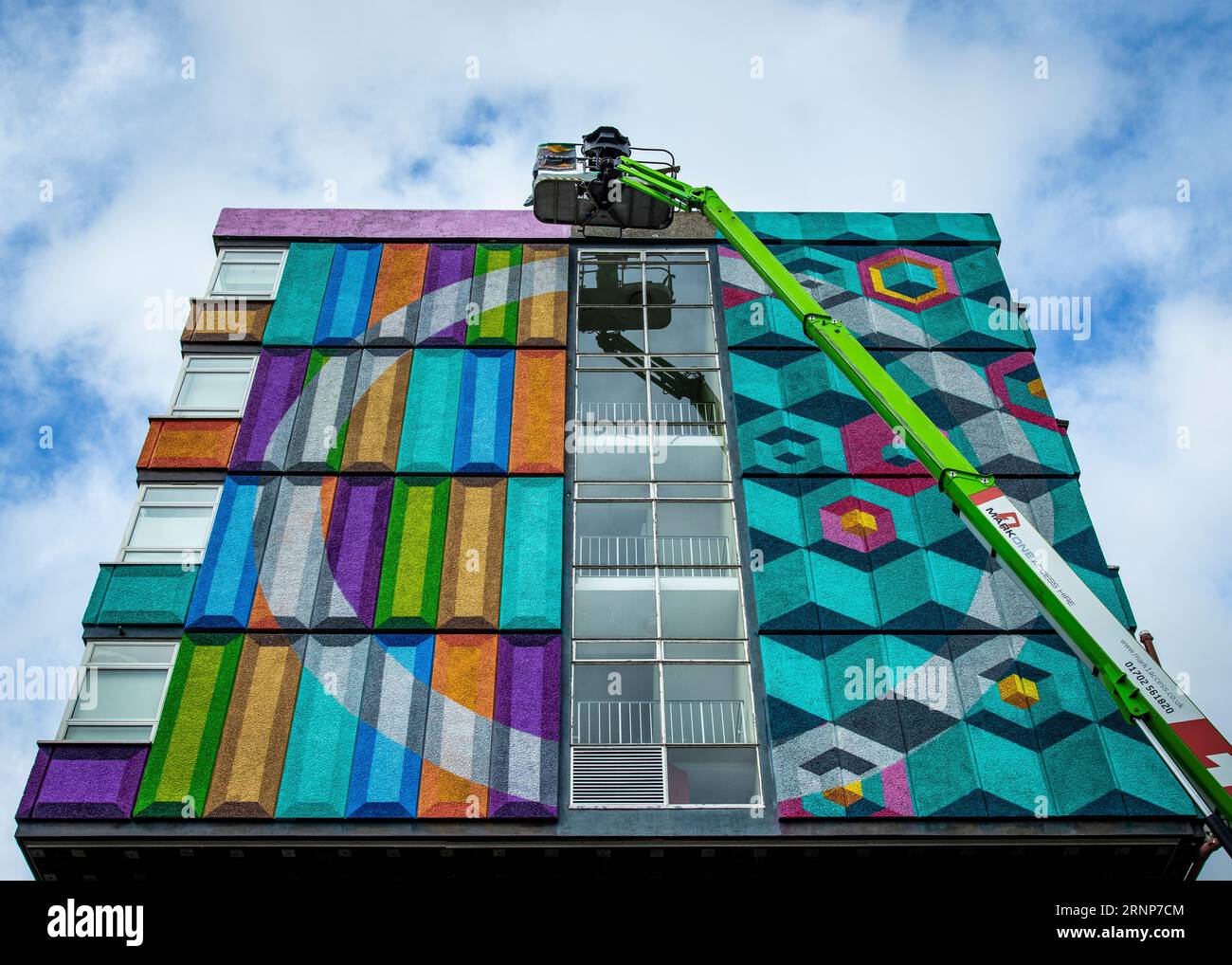Graffiti artists creating street art pieces at the at the Southend City ...