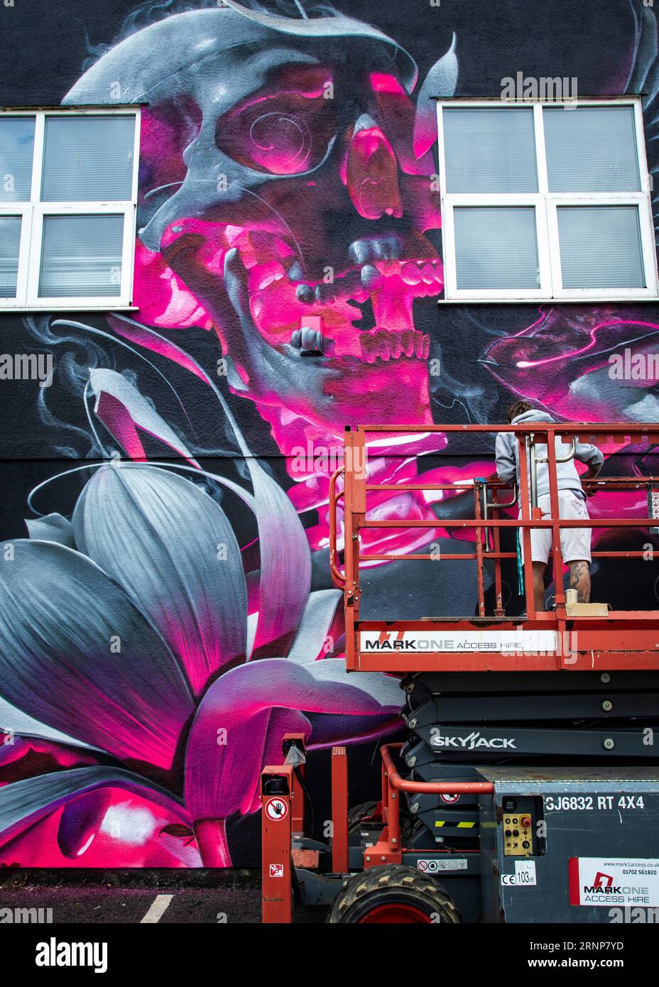 Graffiti artists creating street art pieces at the at the Southend City ...