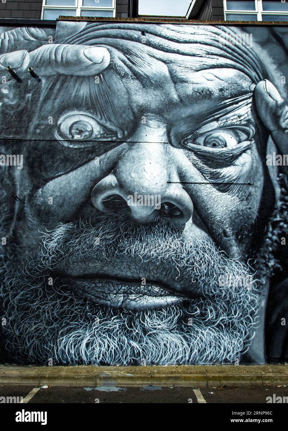 Graffiti artists creating street art pieces at the at the Southend City ...