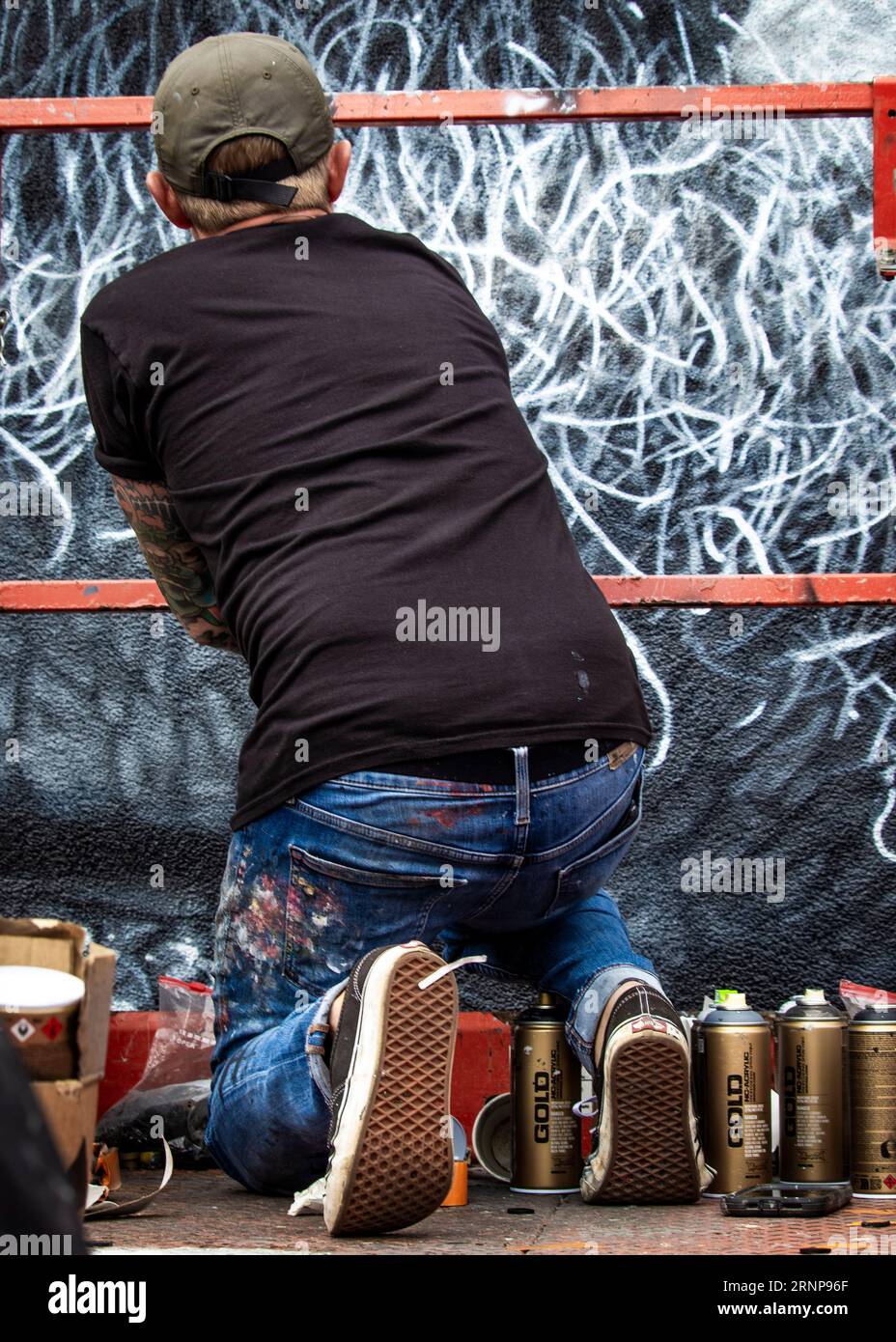 Graffiti artists creating street art pieces at the at the Southend City ...