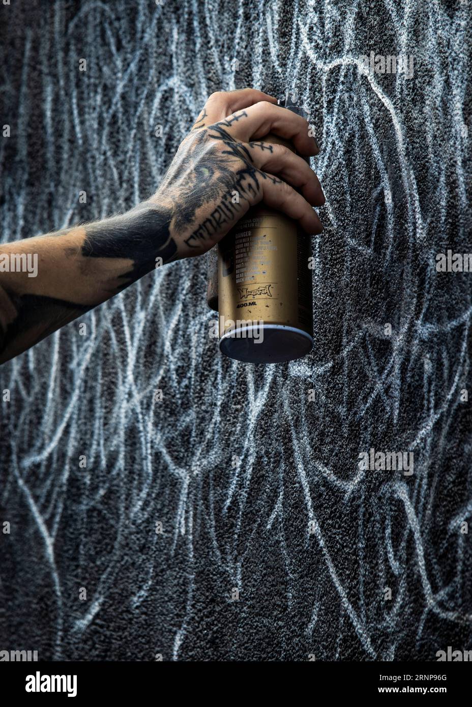 Graffiti artists creating street art pieces at the at the Southend City ...