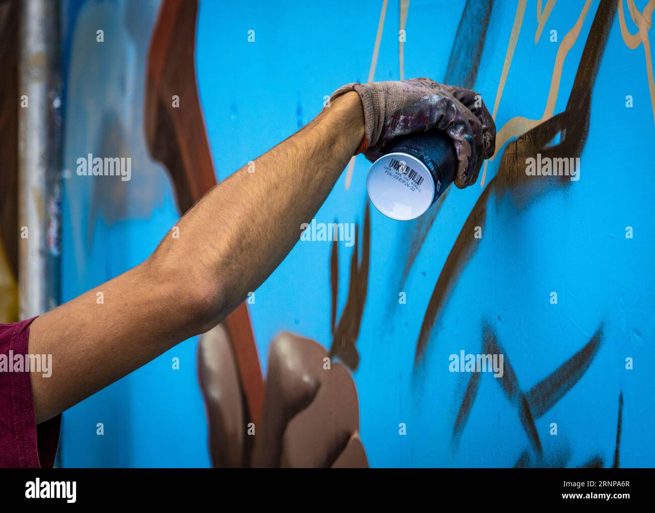 Graffiti artists creating street art pieces at the at the Southend City ...