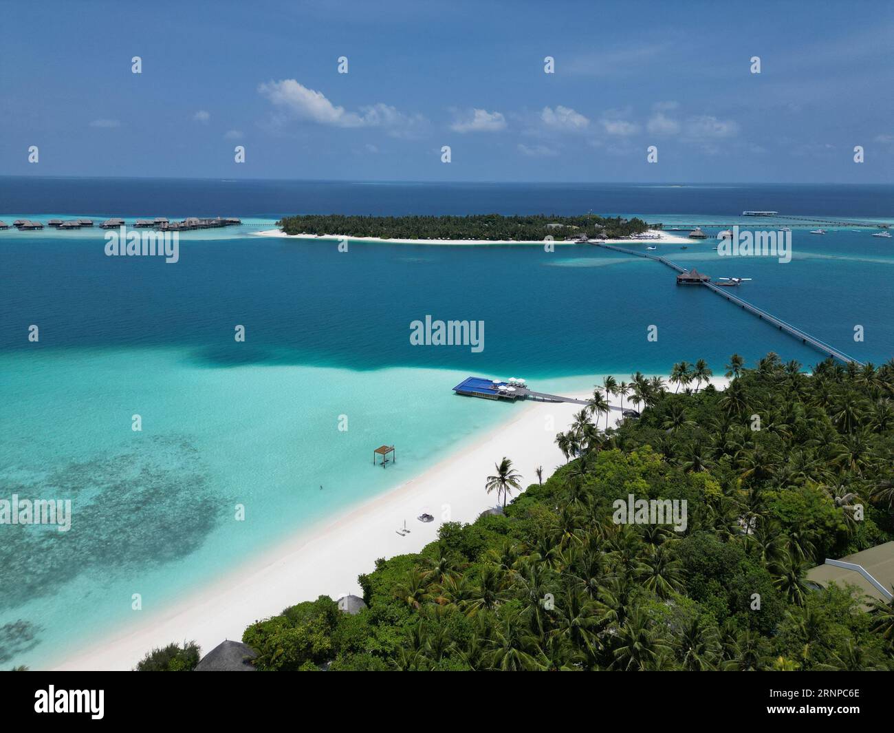 An aerial view of Conrad Maldives Rangali Island with bungalows Stock ...