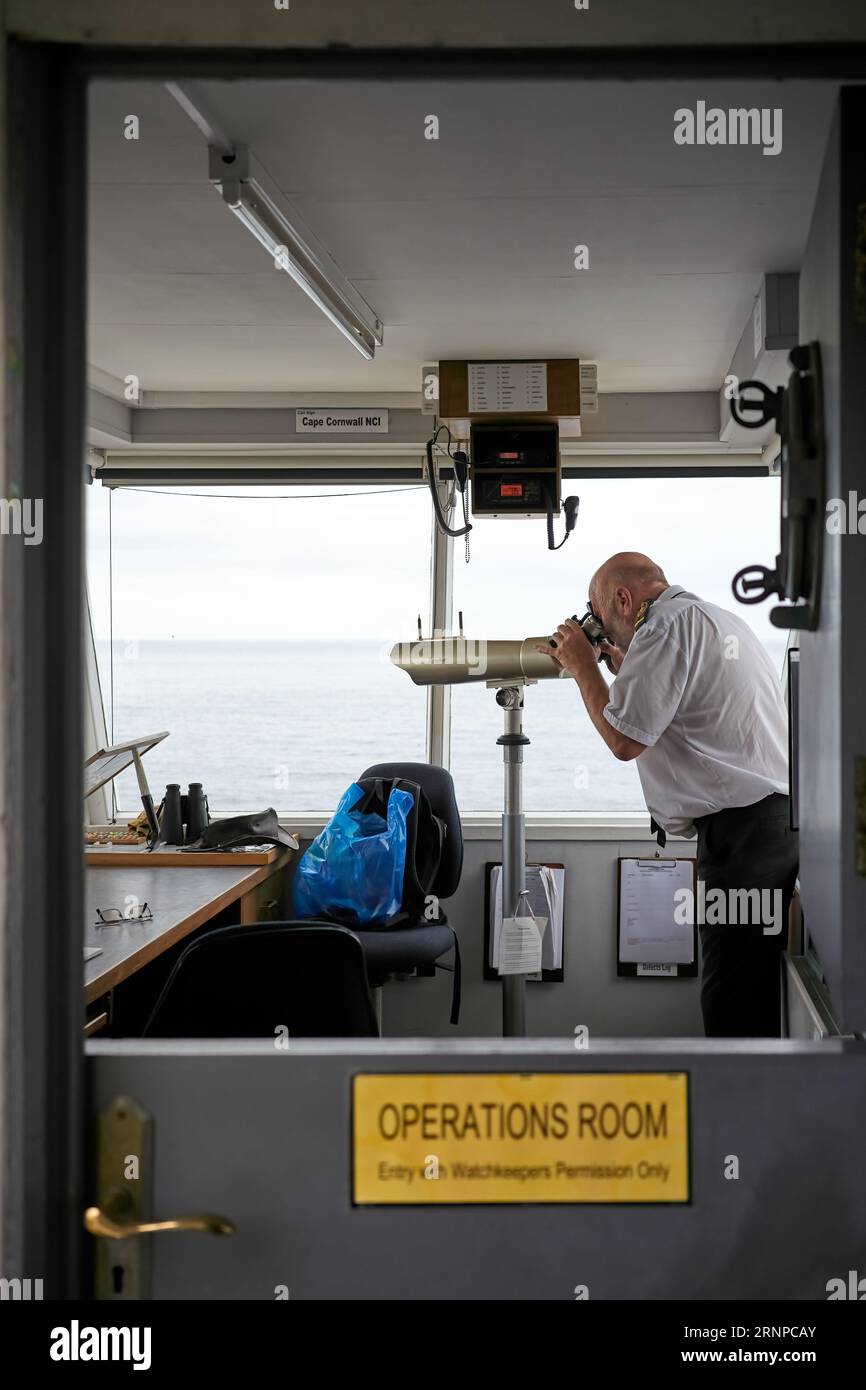 An NCI, National Coastwatch Institution, officer on lookout at Cape ...
