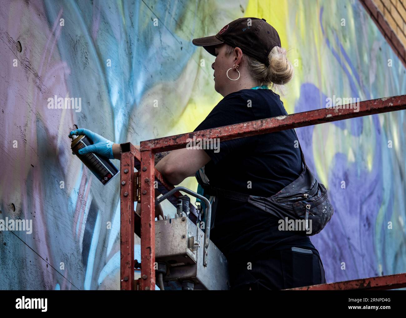 Graffiti artists creating street art pieces at the at the Southend City ...