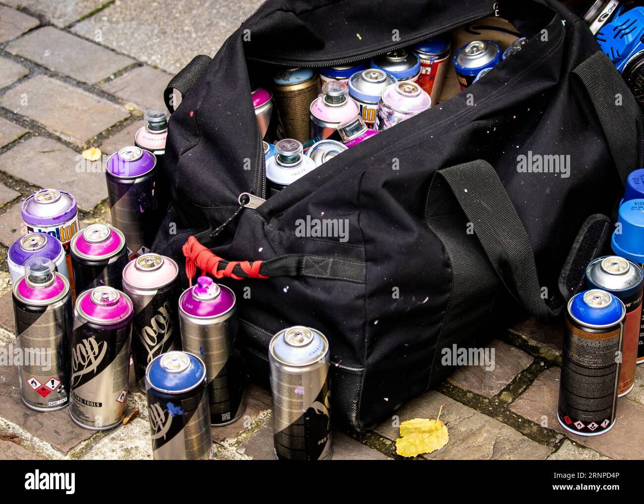 Graffiti artists creating street art pieces at the at the Southend City ...