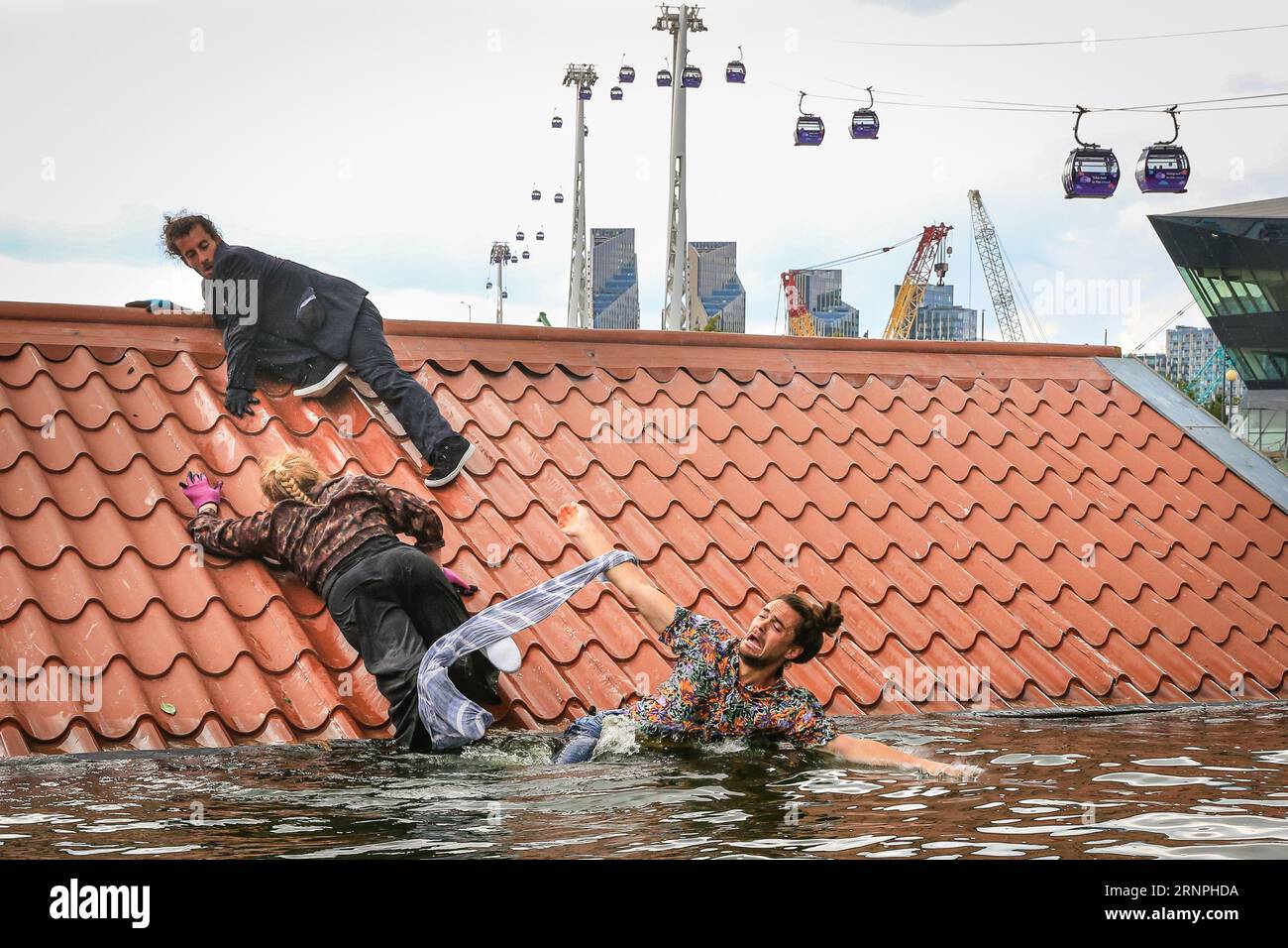 London, UK. 02nd Sep, 2023. Performers end up floating in the water as ...