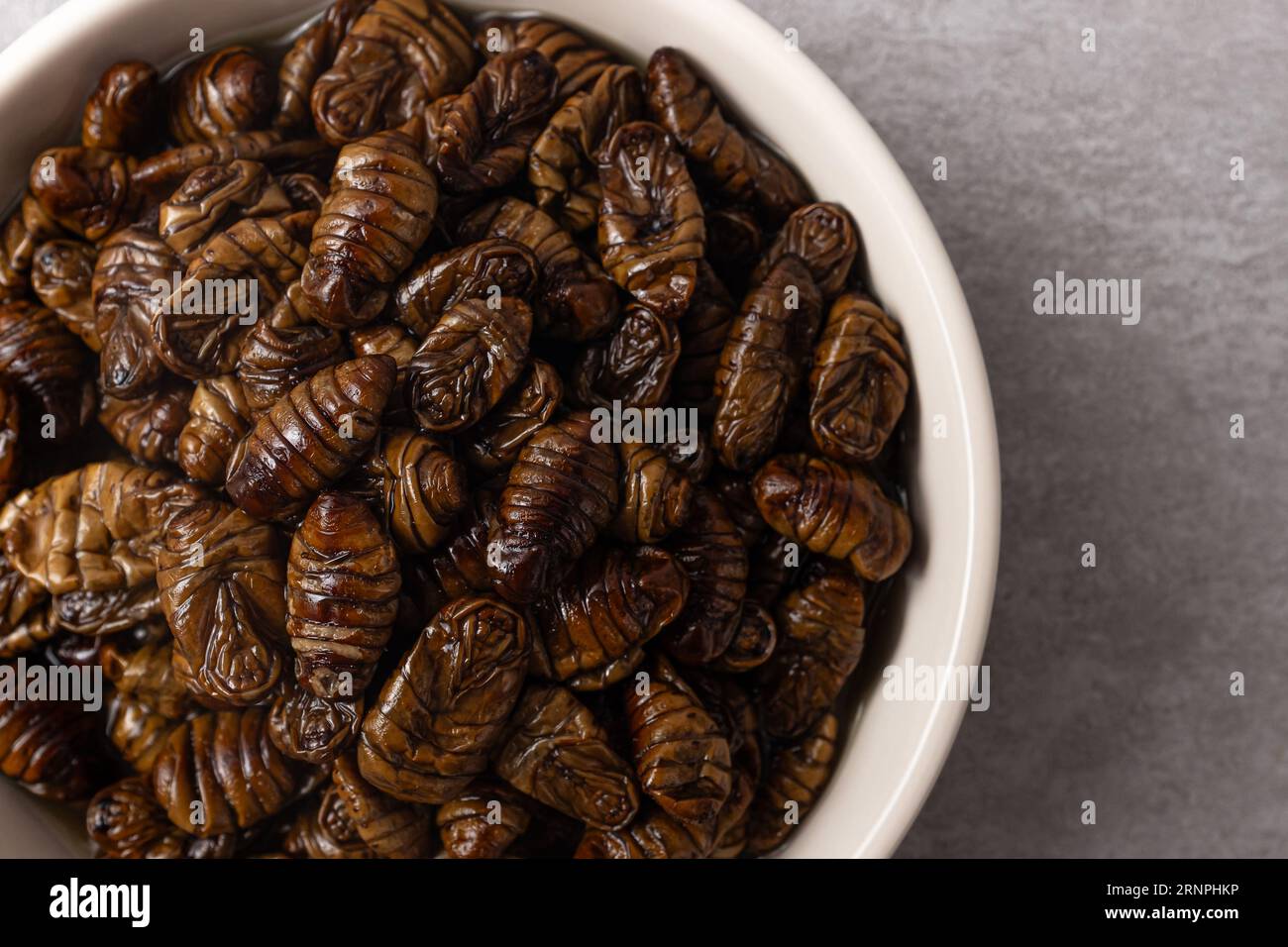 food made from pupa. edible insects rich in protein. Korean food ...