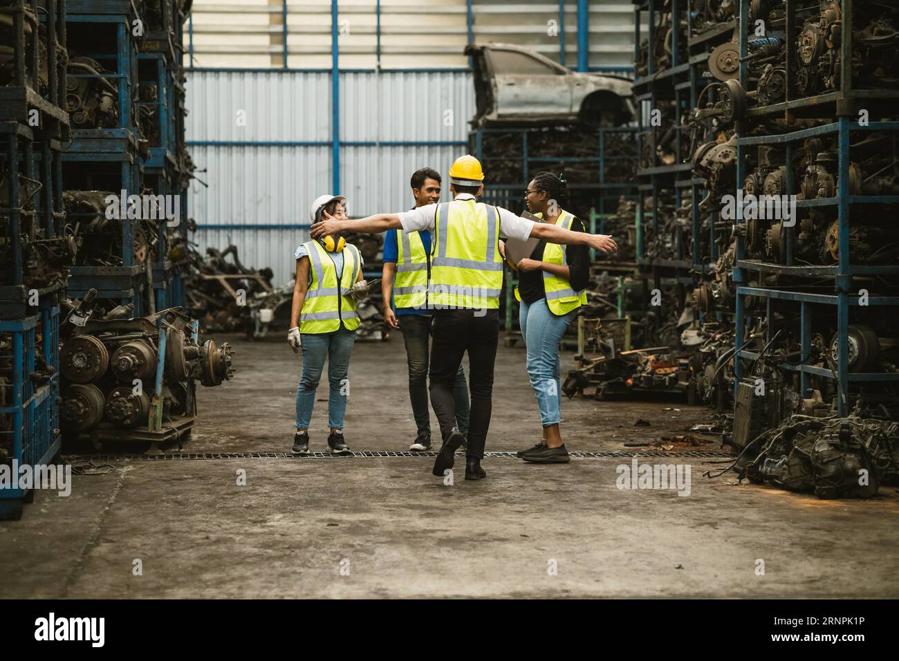 engineer worker team together happy working in old grunge garage used ...