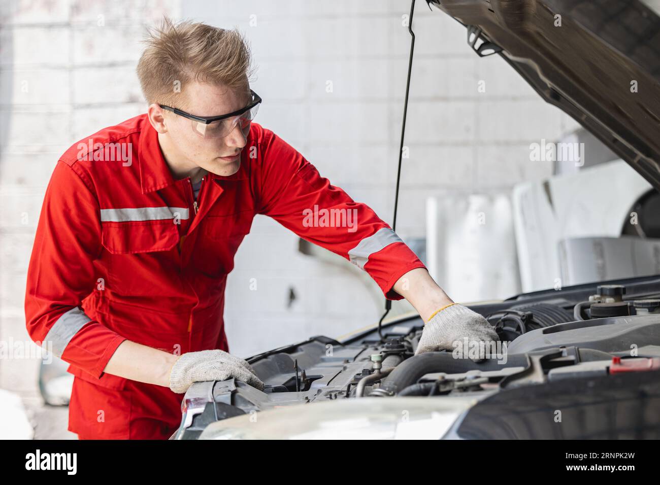 portrait happy garage mechanic male worker working fix service ...