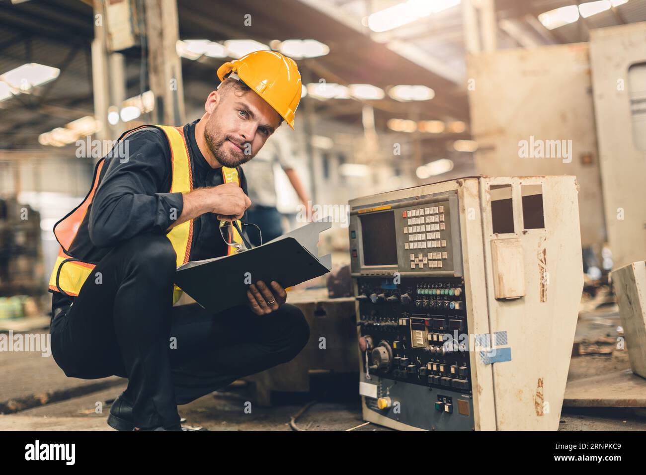 portrait engineer male worker schedule machine service check. inspector ...