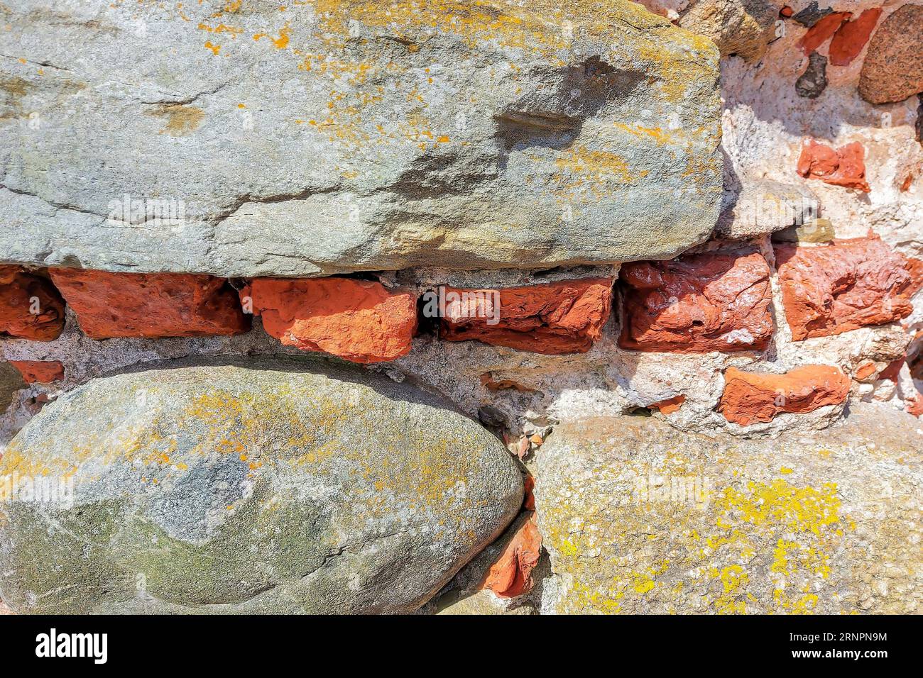 Ancient medieval stone wall texture background. The wall is partially collapsed Stock Photo - Alamy