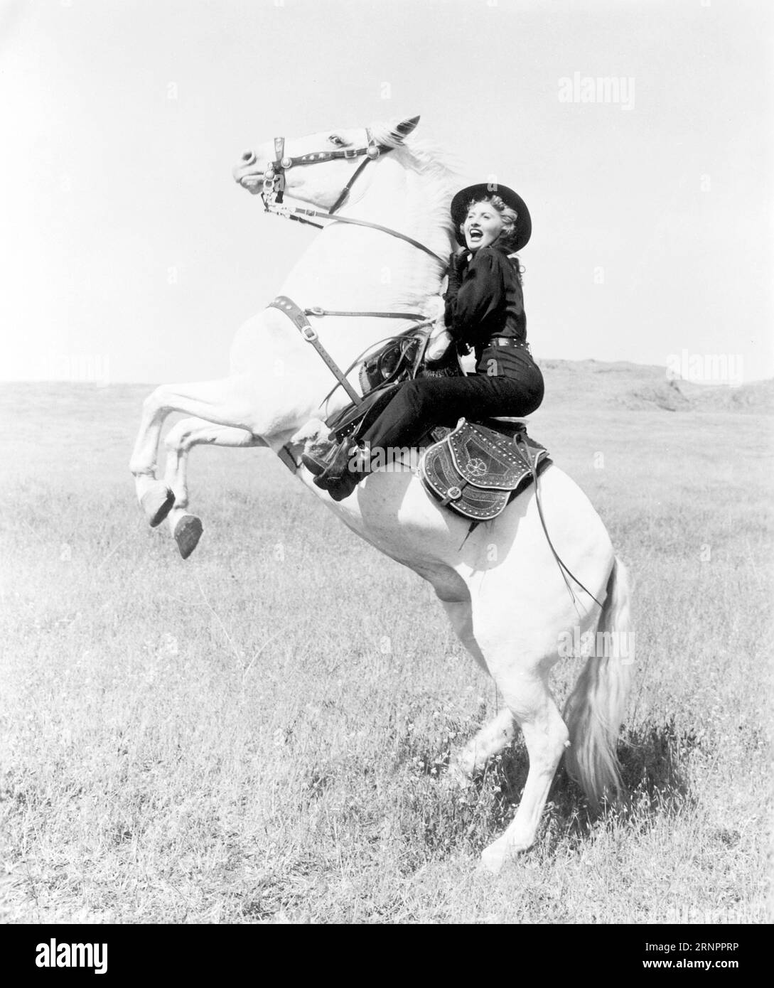 BARBARA STANWYCK in FORTY GUNS (1957), directed by SAMUEL FULLER ...
