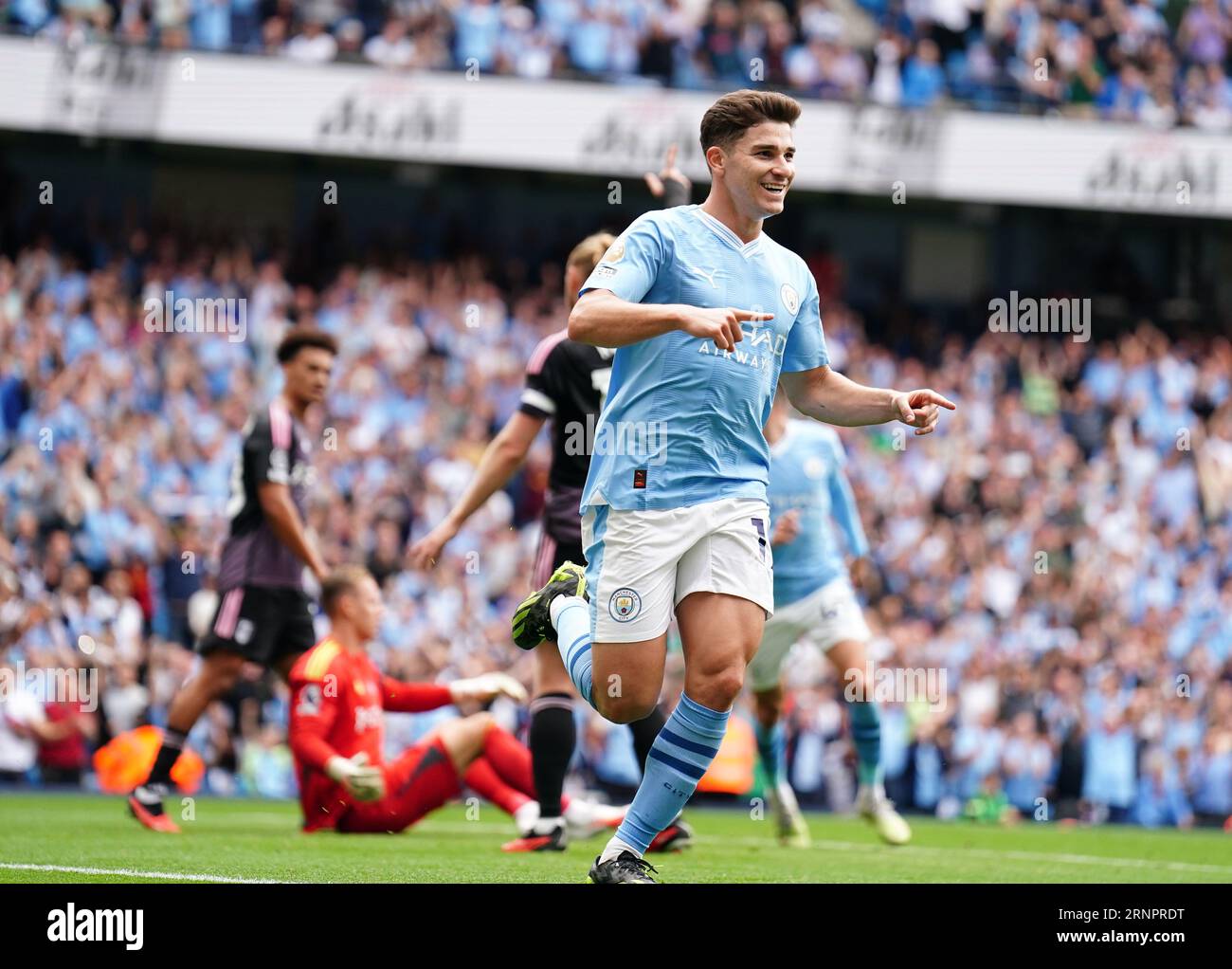 Manchester City's Julian Alvarez (centre) celebrates scoring their side ...