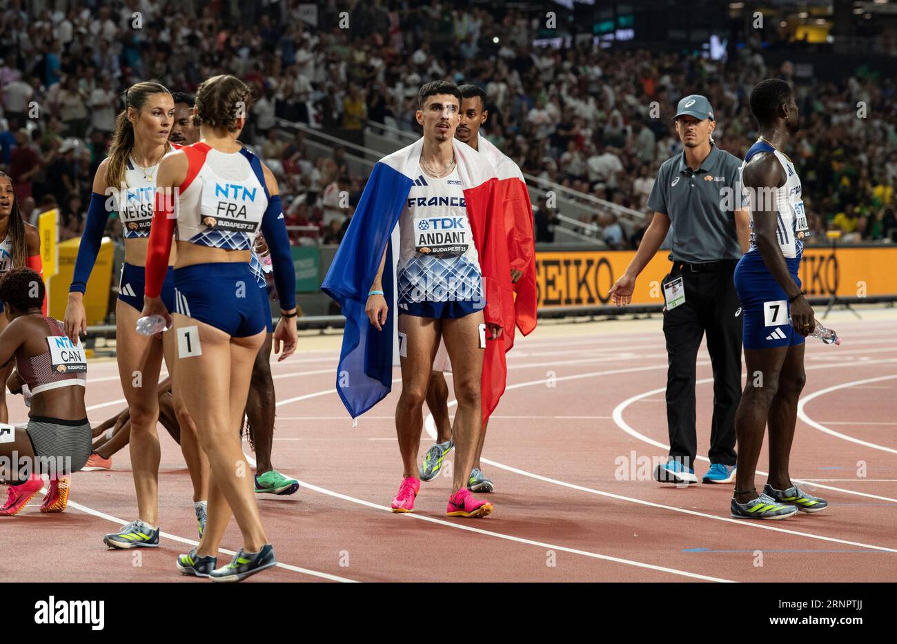 Team France celebrate after competing in the women’s 4x400m relay final ...