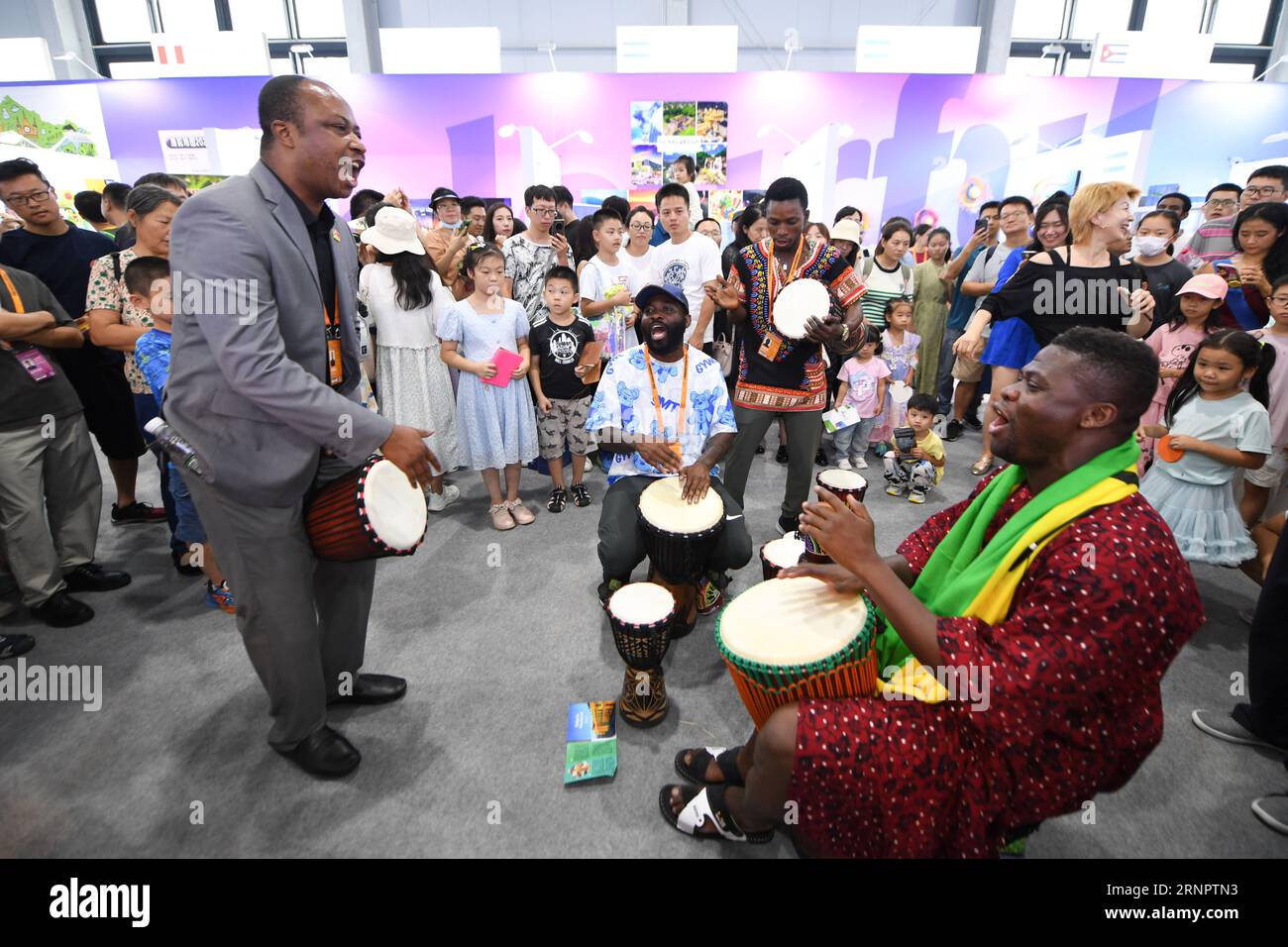 Beijing, China. 2nd Sep, 2023. Staff members perform at an exhibition ...