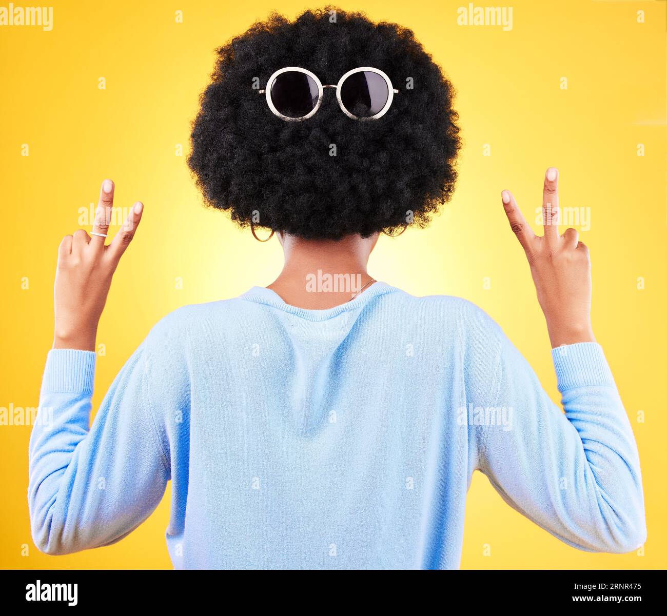 Peace sign, sunglasses and afro of black woman for fashion in studio ...