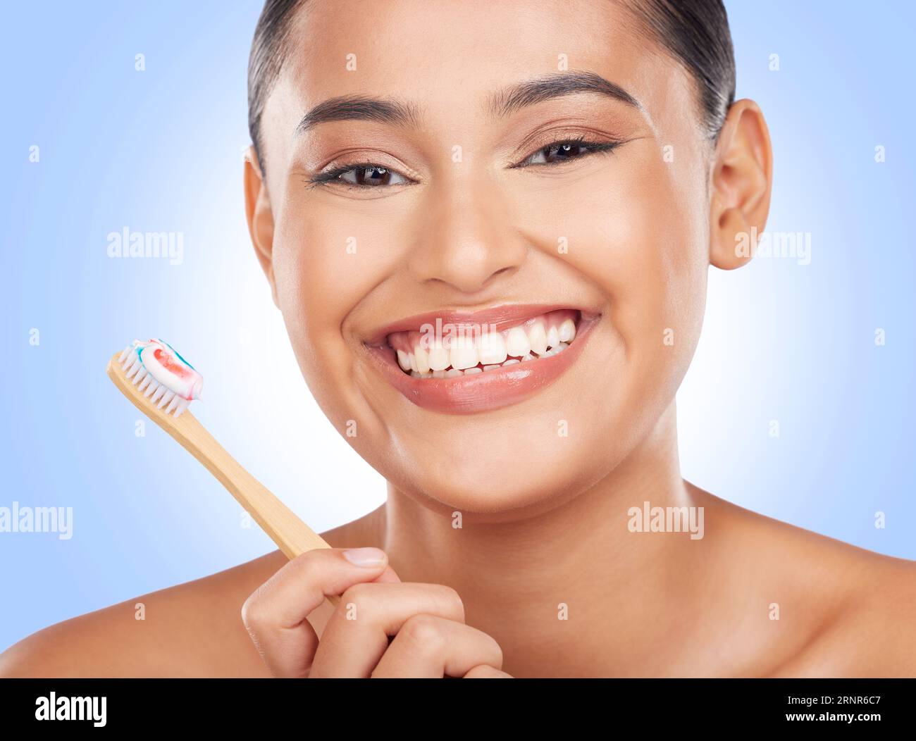 Happy portrait, woman and toothbrush on blue background for dental cleaning, gingivitis and ...