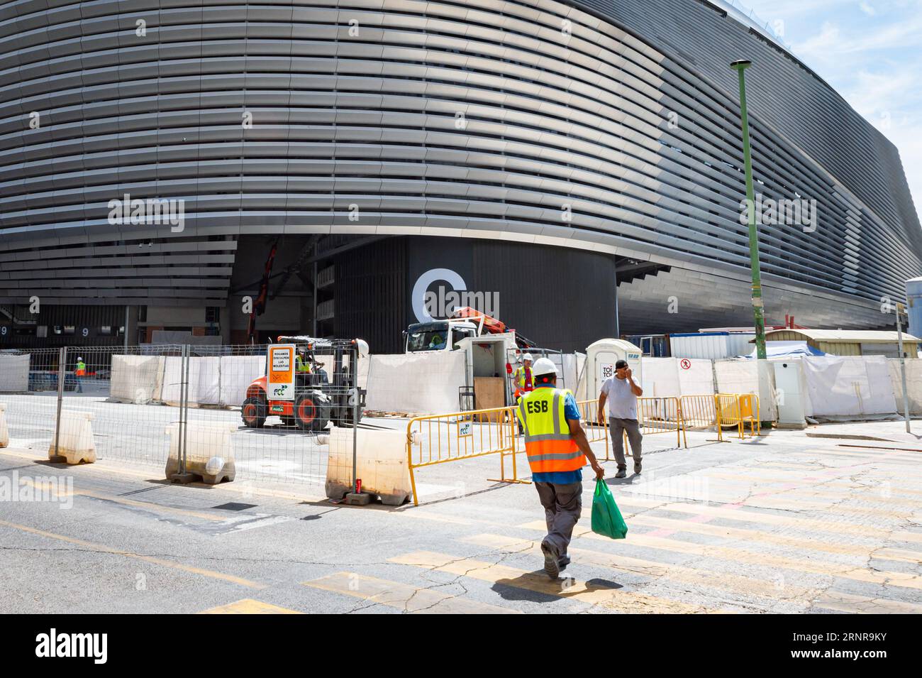 Workers seen near the construction site of the Santiago Bernabeu ...