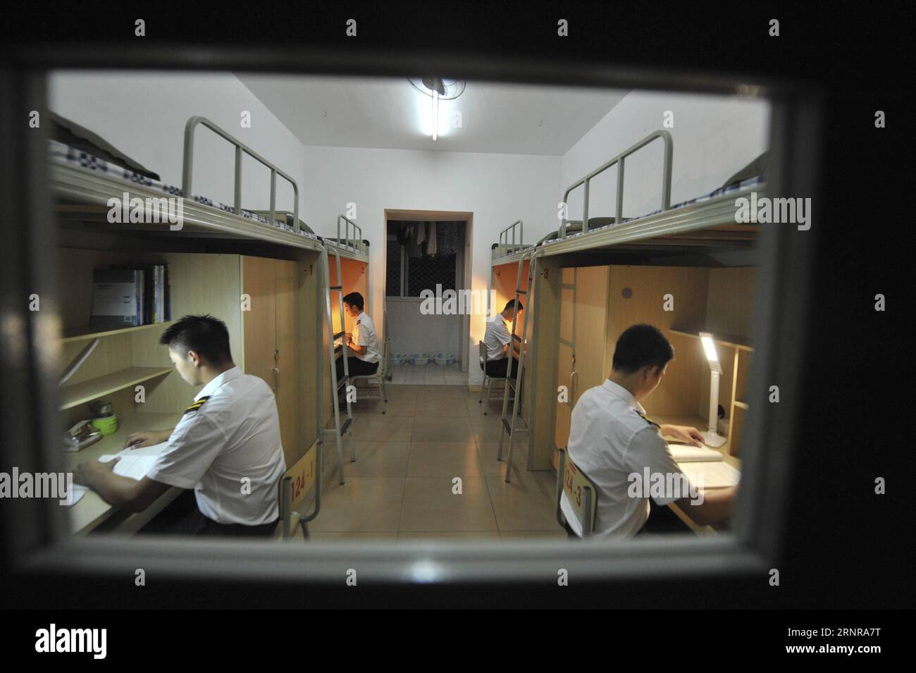 (170924) -- GUANGHAN, Sept. 24, 2017 -- Cadets review lessons in a dorm ...