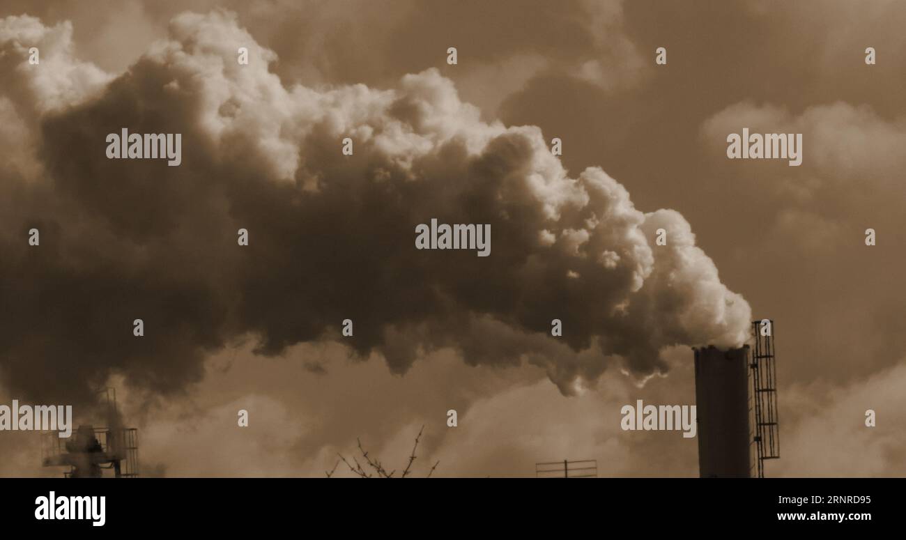 Smokestack of Sugar Refinery with Water Vapour, Near Caen in Normandy ...