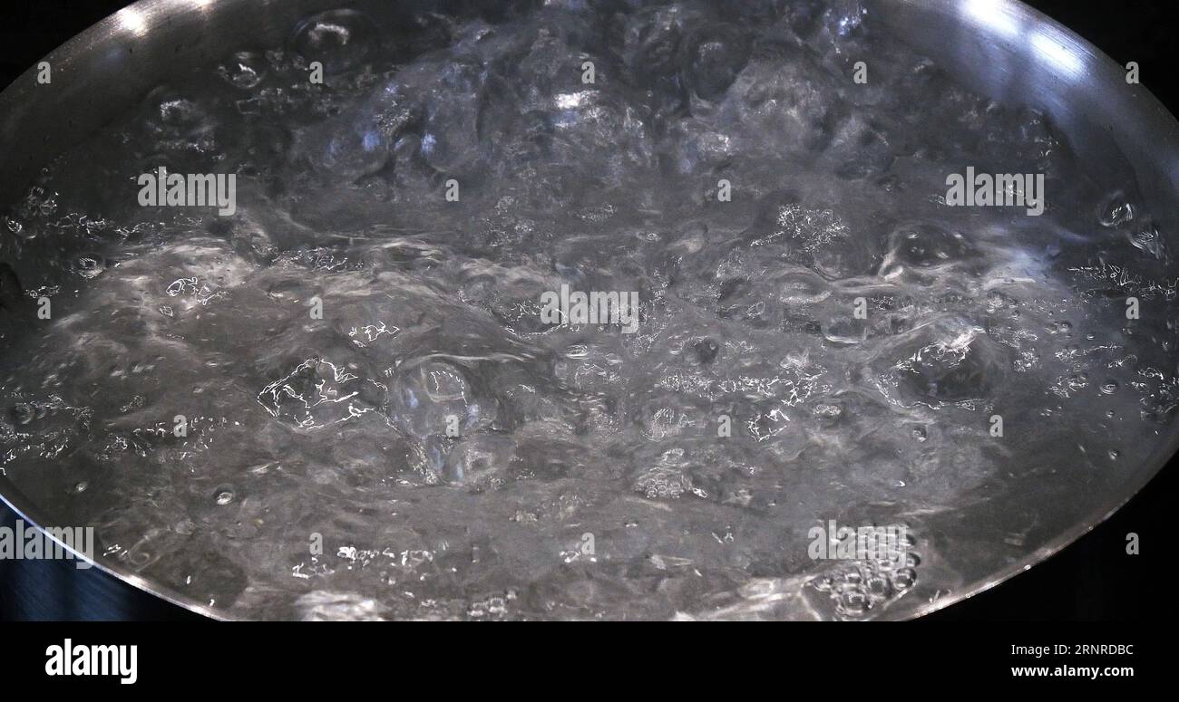 Hot Boiling Water in a saucepan Stock Photo - Alamy