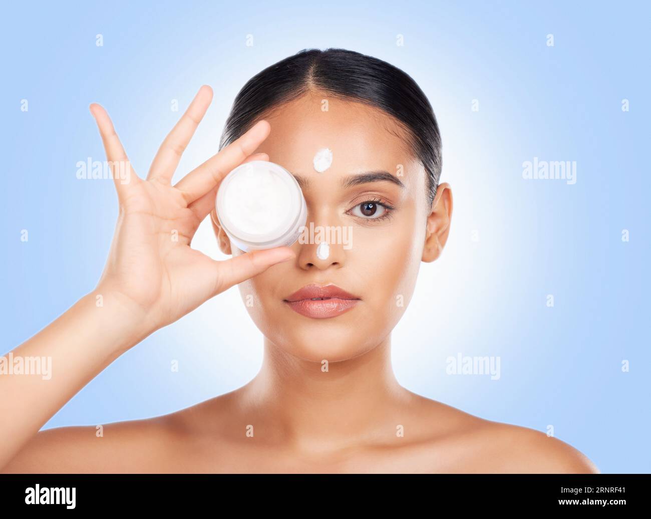 Portrait, dermatology and woman with cream, skincare and lotion on a ...