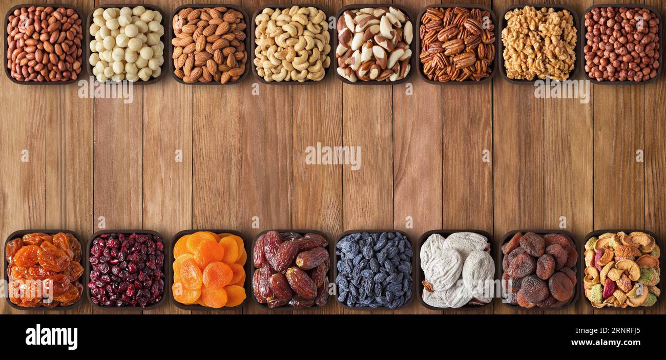 nuts and dried fruit with copy space table. healthy snacks on top, food ...