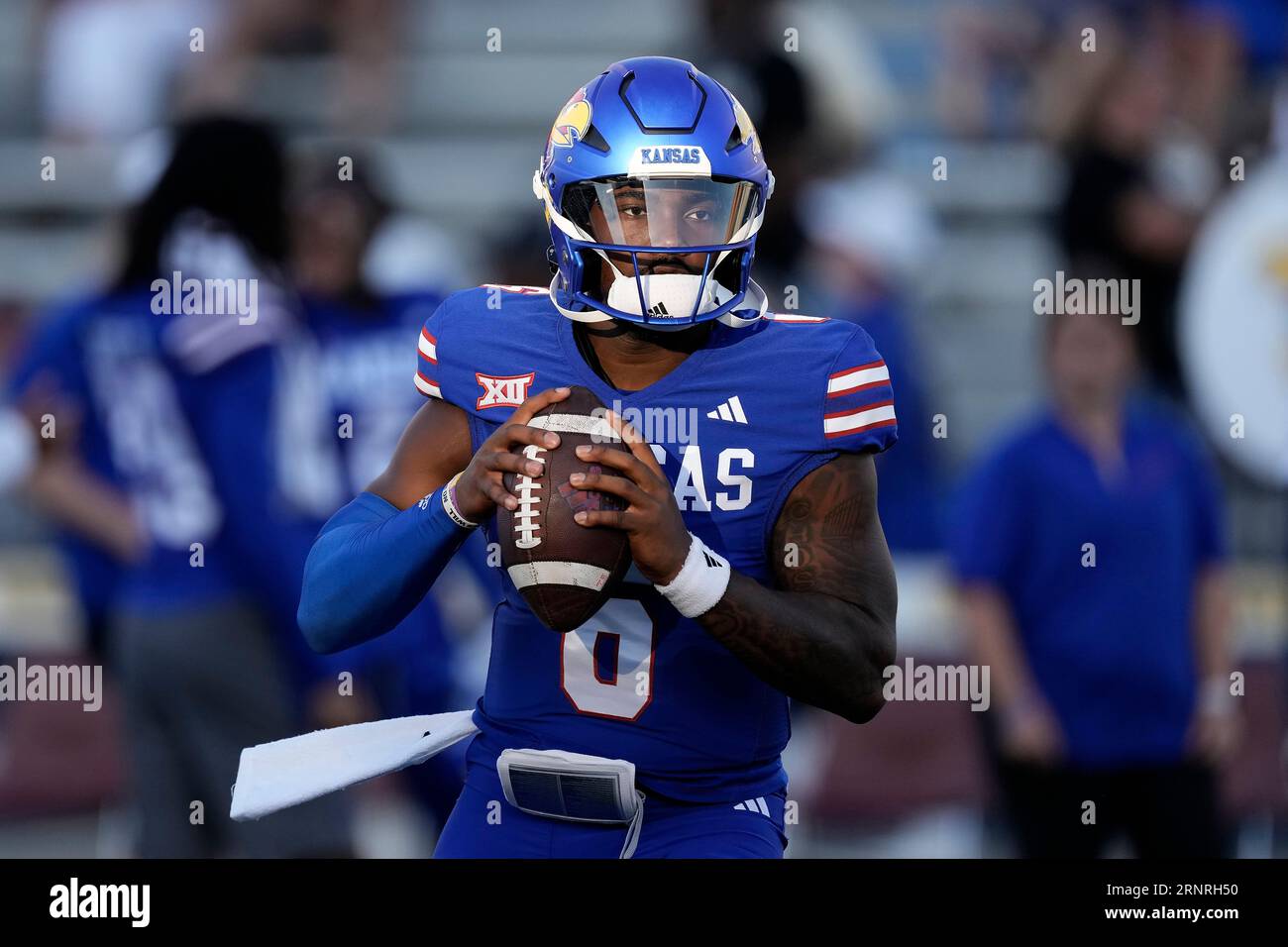 Kansas quarterback Jalon Daniels looks to pass before an NCAA college ...