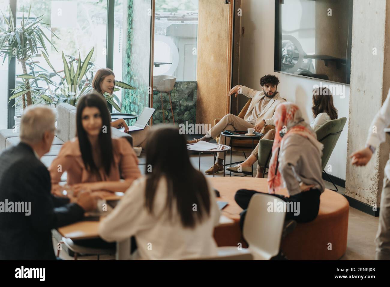 Inter-generational, multi-ethnic business group solving project ... Inter-generational, multi-ethnic business group solving project ...